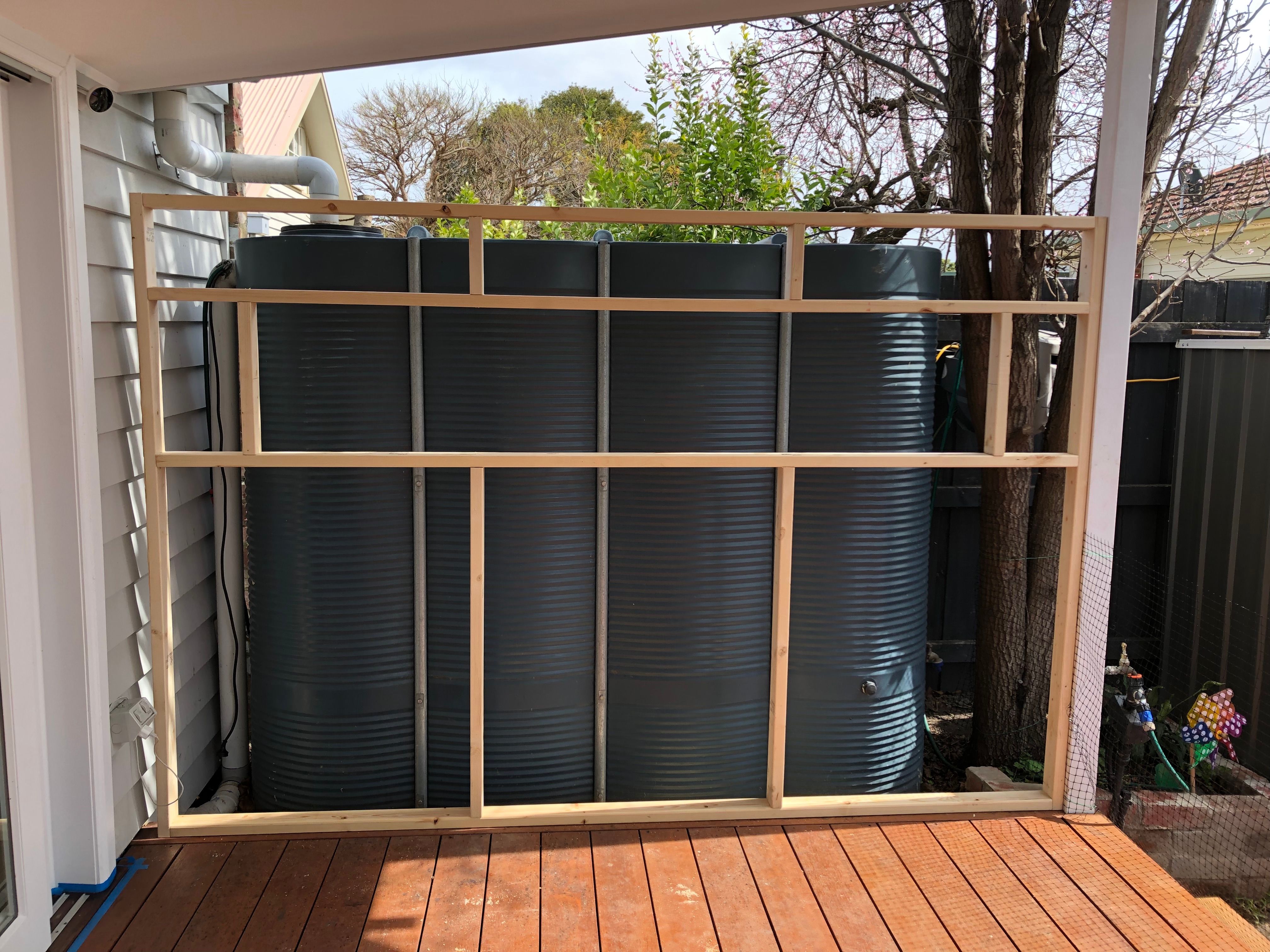 Outdoor kitchen with Merbau feature wall | Bunnings Workshop community