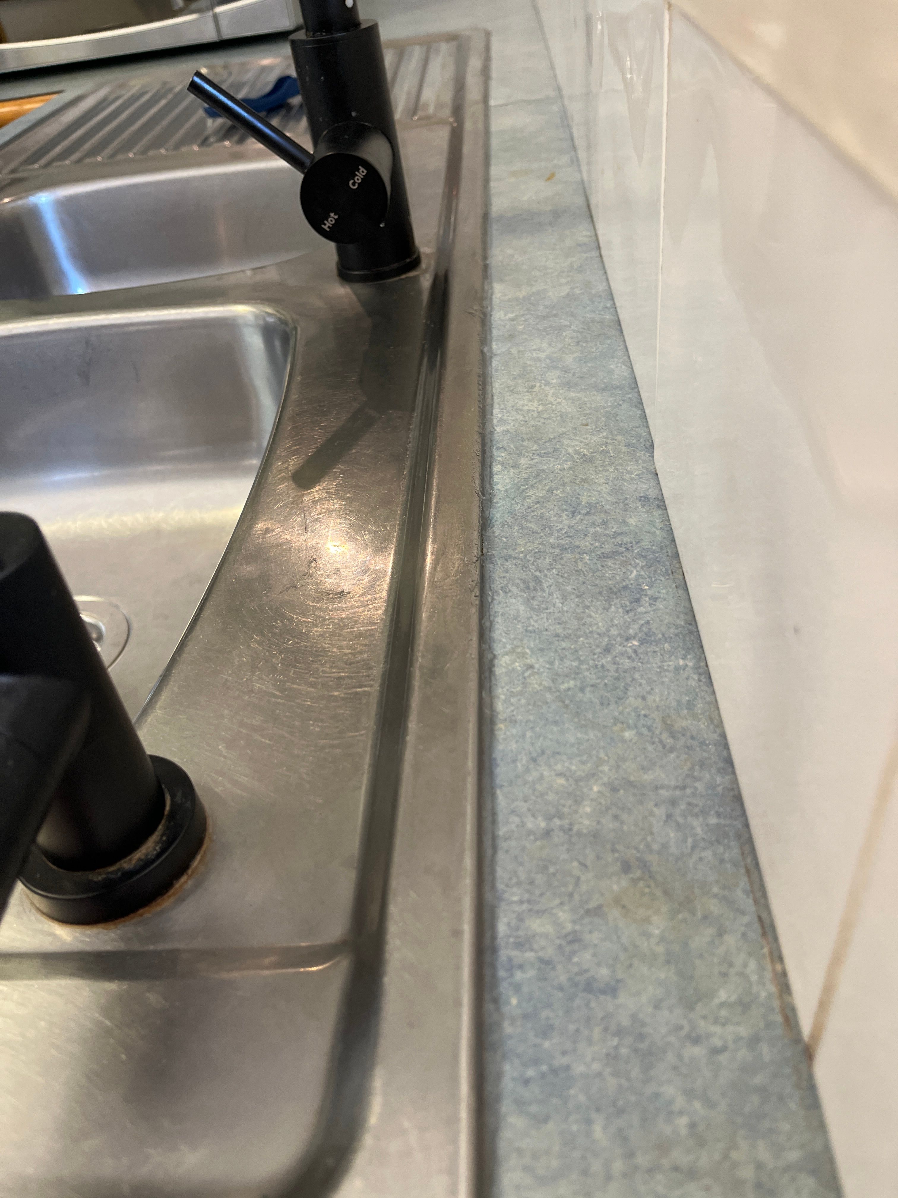 How do i fix up the kitchen sink edge? | Bunnings Workshop community