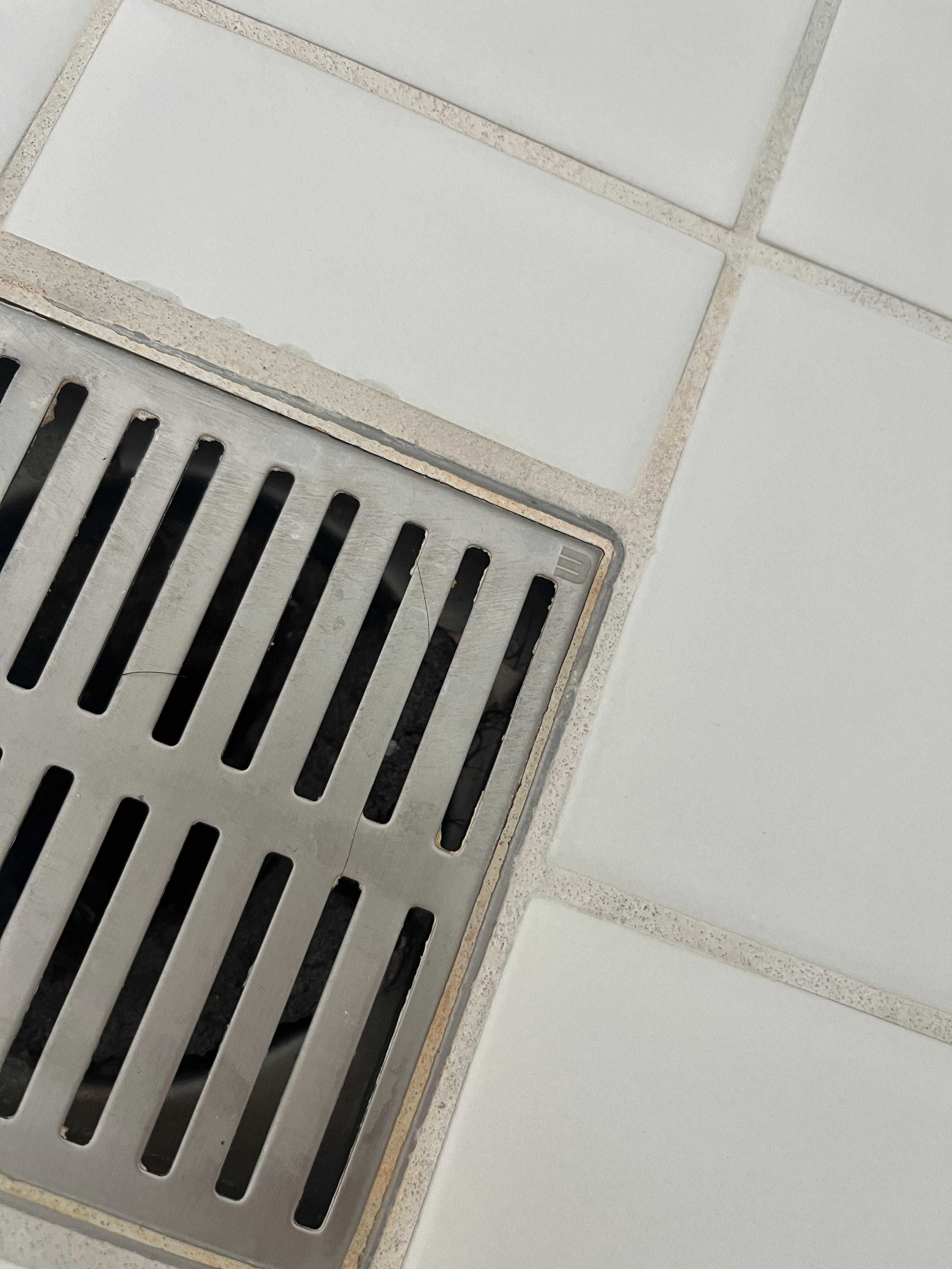 How to remove shower drain grate? | Bunnings Workshop community