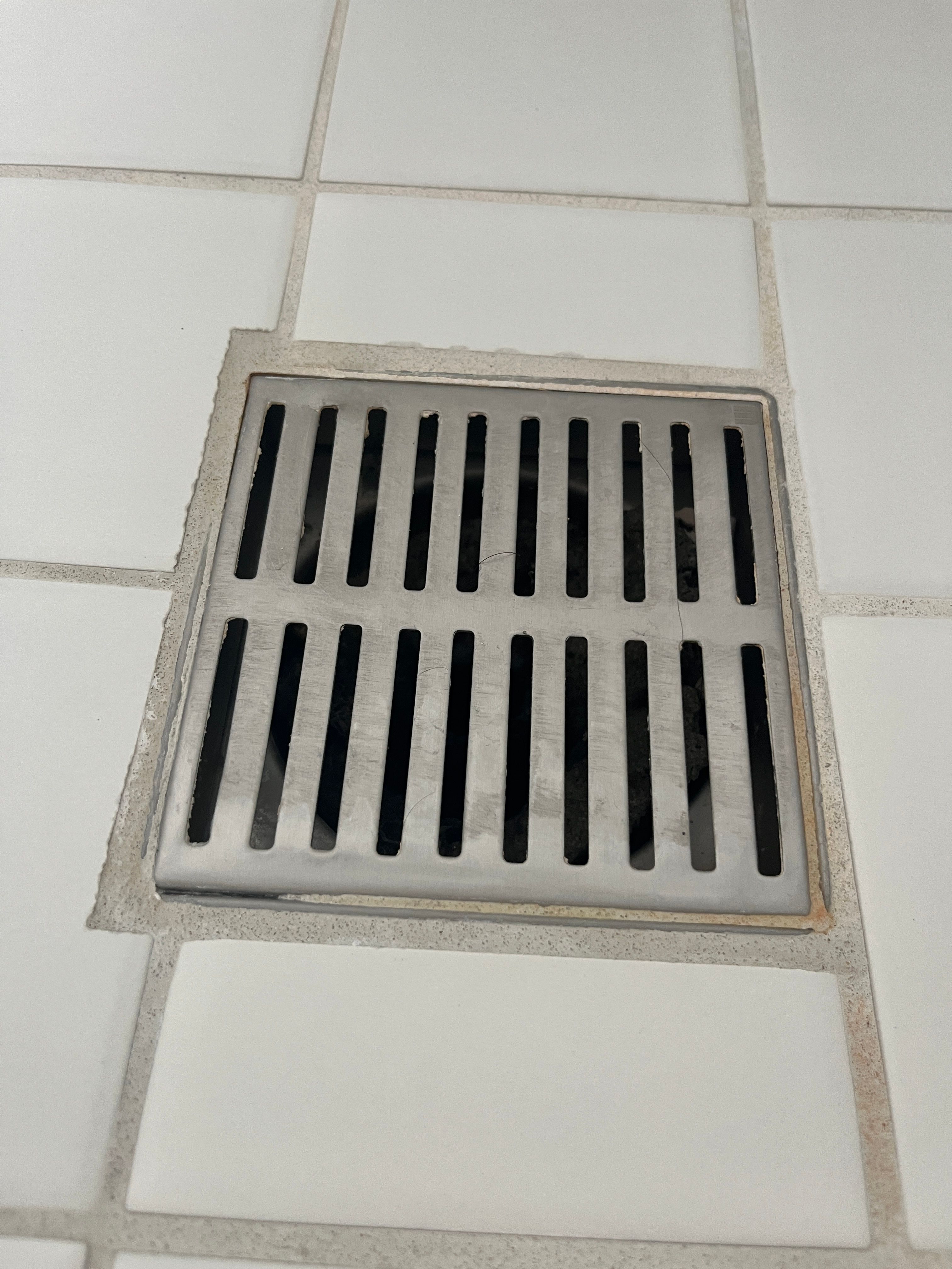 How to remove shower drain grate? | Bunnings Workshop community