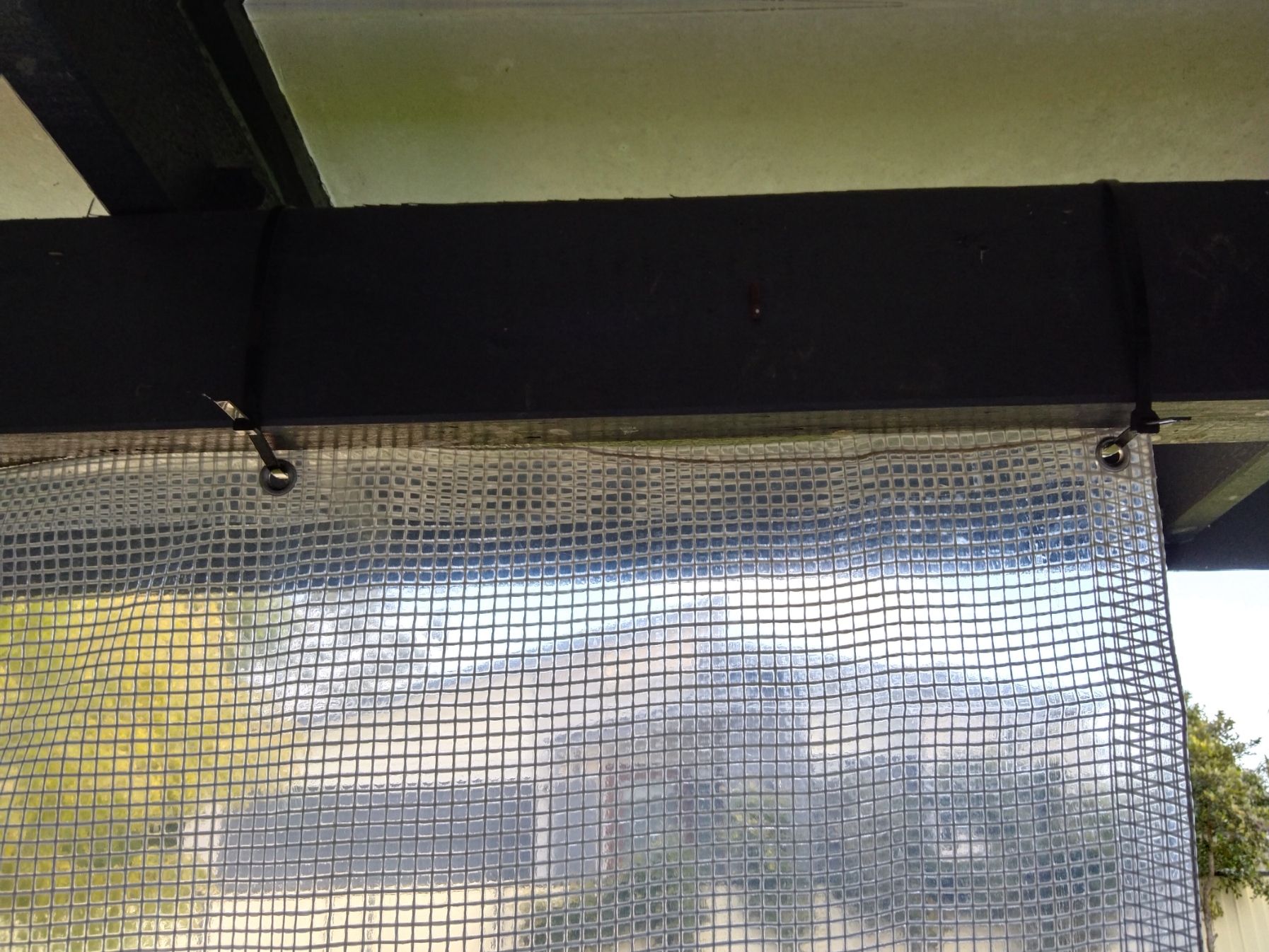 How to tie polytuf tarps to patio post e... | Bunnings Workshop community