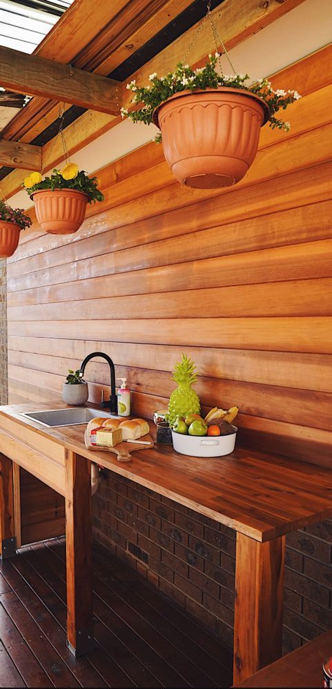 Outdoor kitchen with Merbau feature wall | Bunnings Workshop community