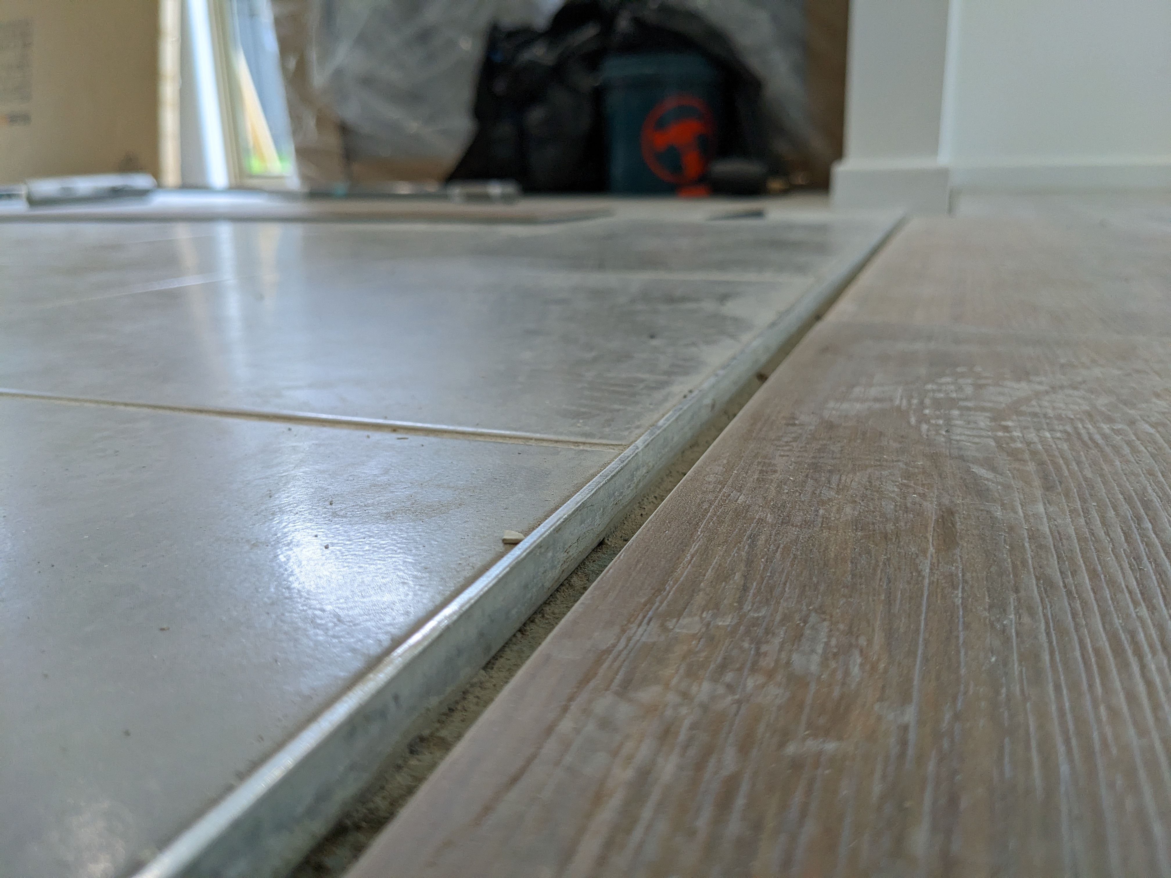How to transition from tile to hybrid fl... | Bunnings Workshop community