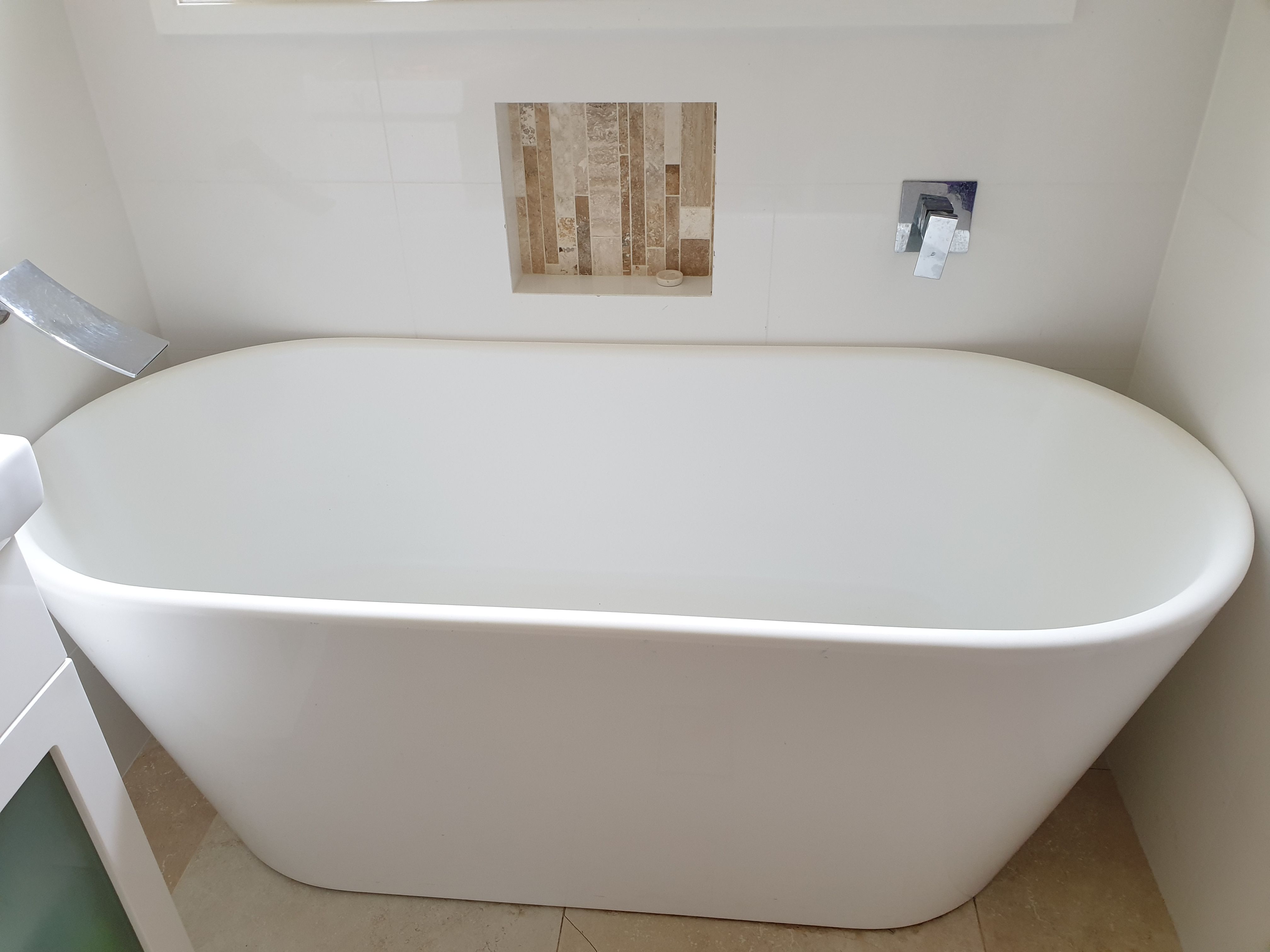 How do I clean behind and under this tub... | Bunnings Workshop community