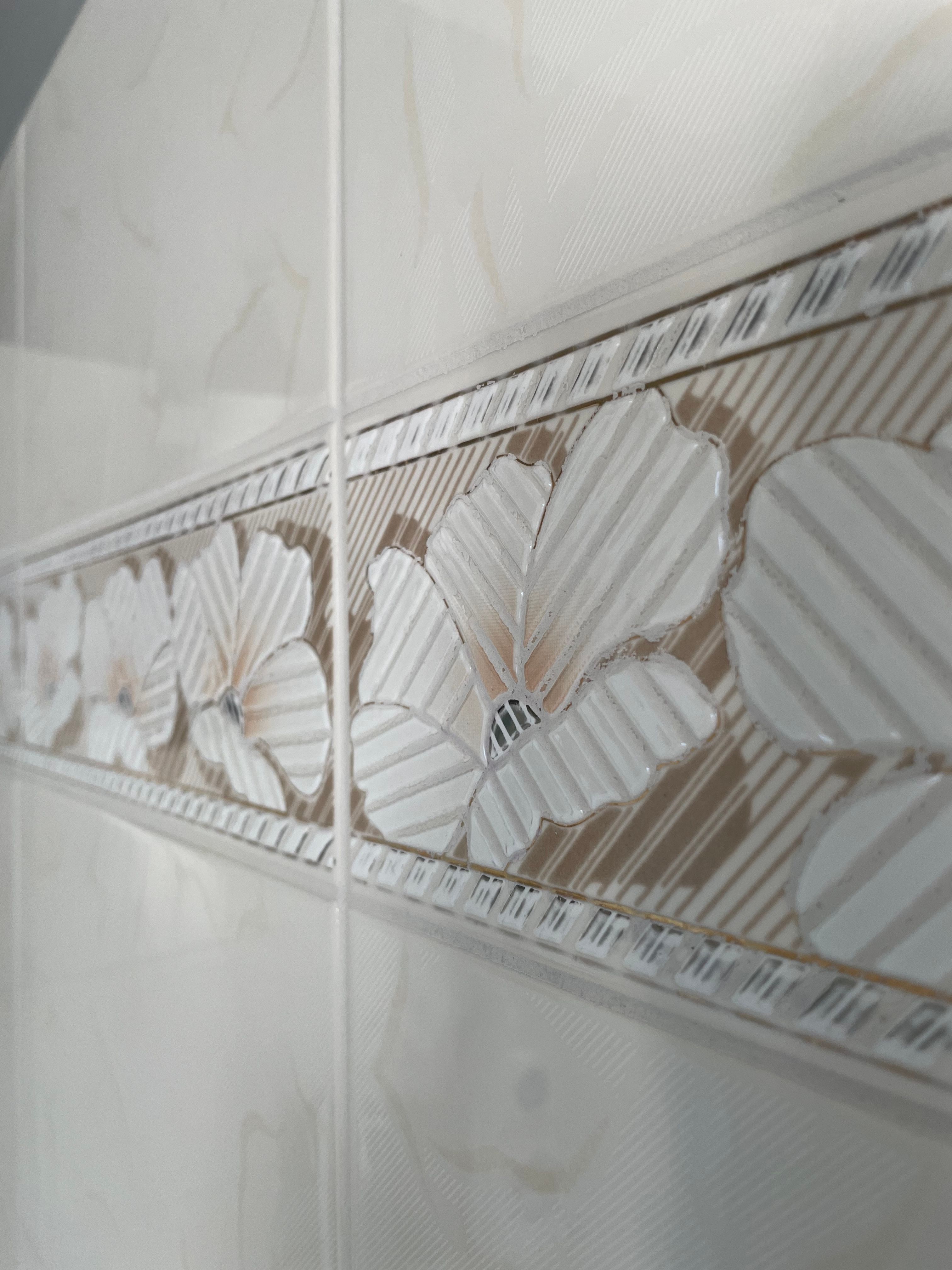 How to cover tiles with raised designs? | Bunnings Workshop community