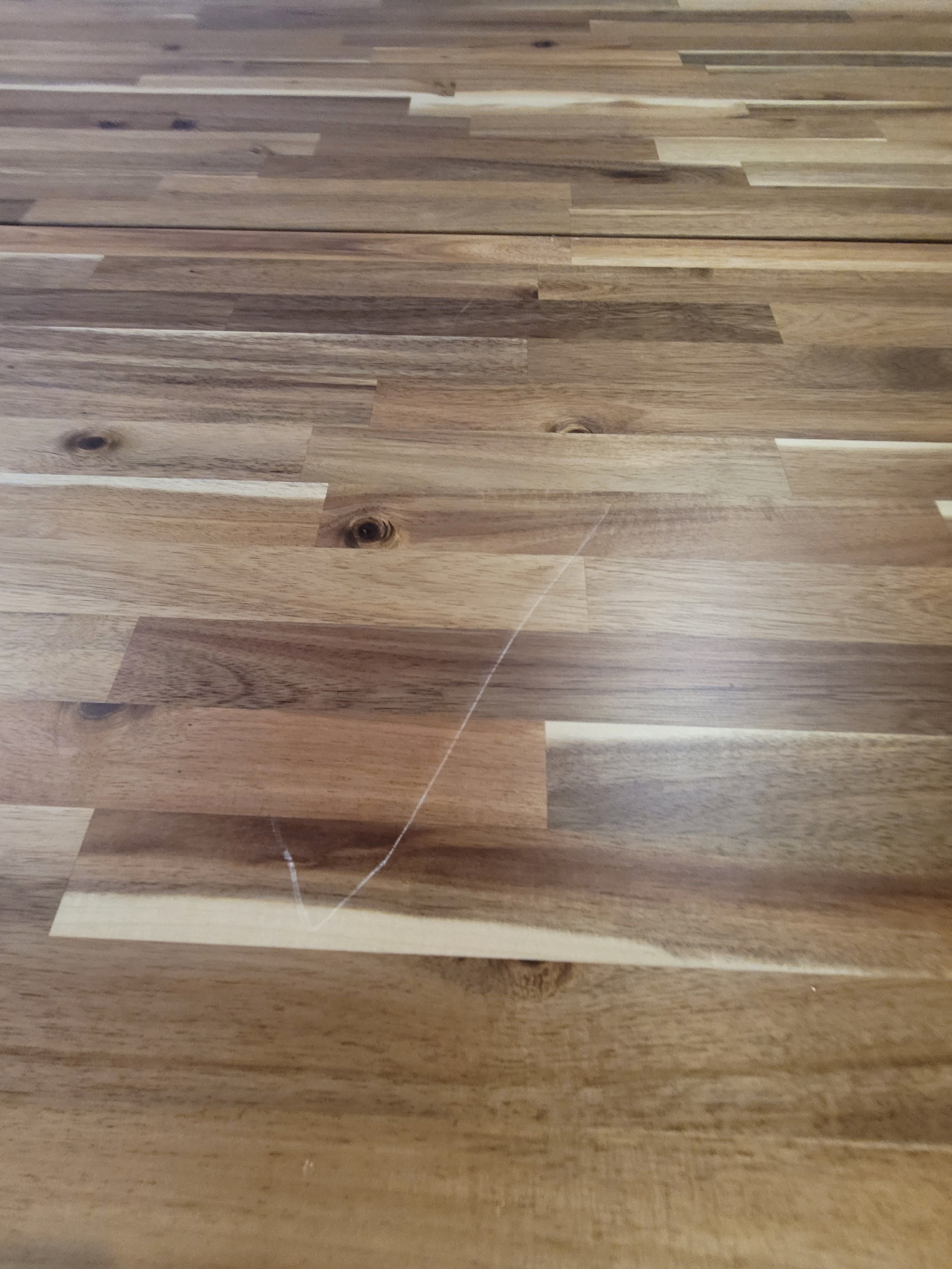 How can we fix this scratch damage on ou... | Bunnings Workshop community