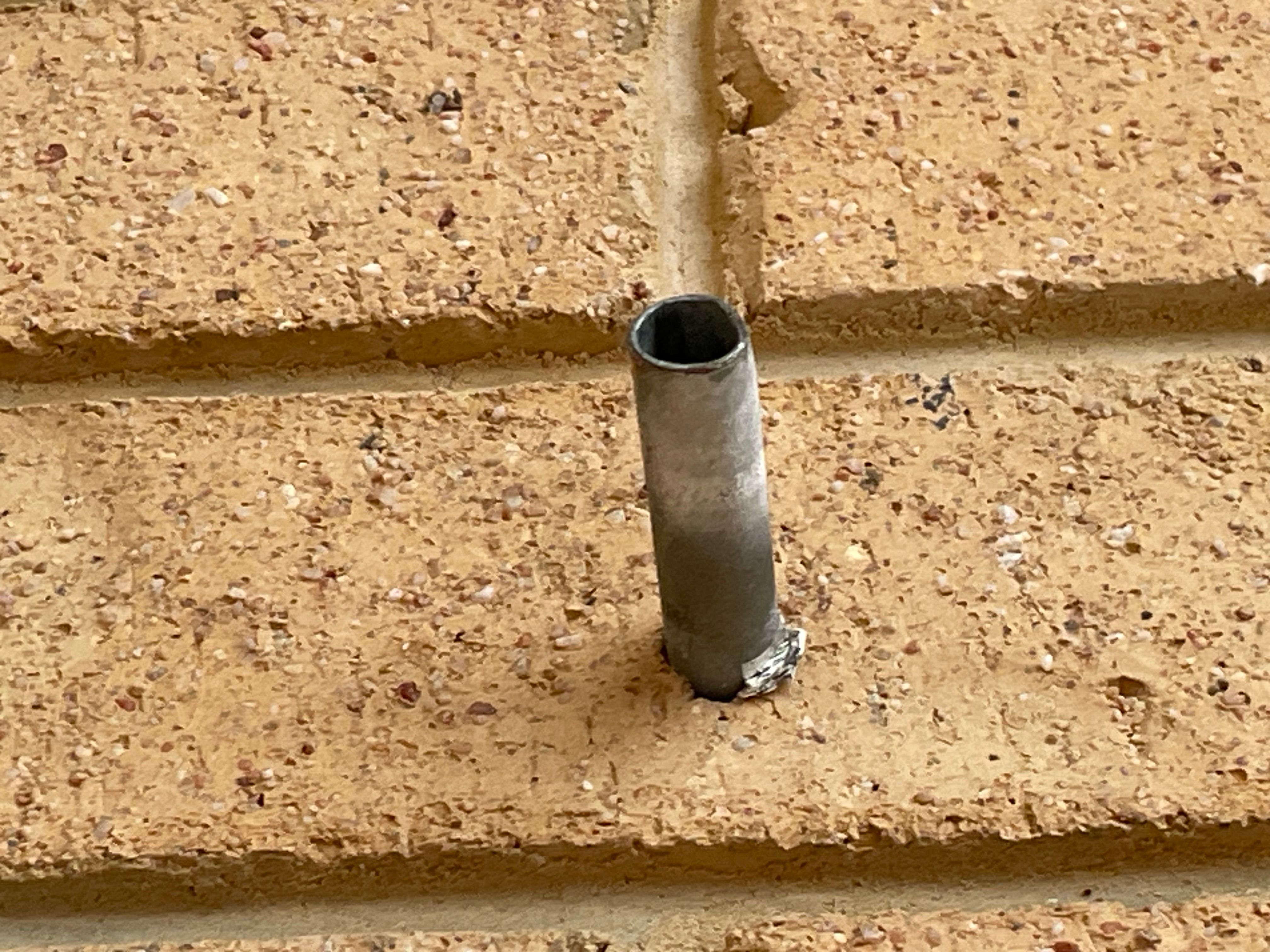 Solved: How to remove bolts from brick wall? | Bunnings Workshop community